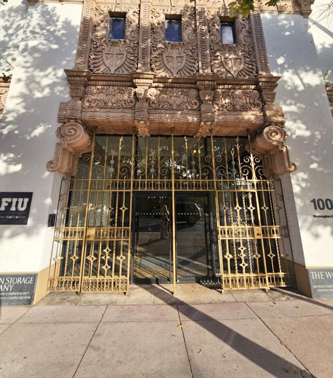The ornate entrance with its golden gates doesn't just mark the threshold &ndash; it signals the transition from Miami Beach's sun-soaked present to its design-rich past.