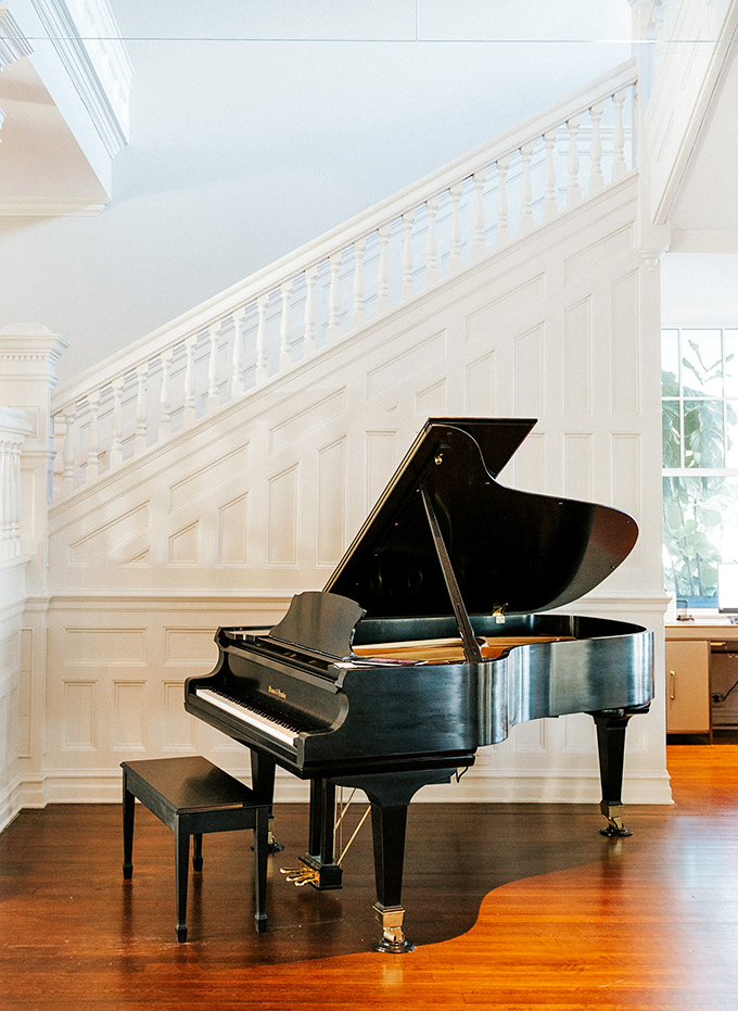 The grand piano isn't just decorative &ndash; it's waiting for someone brave enough to play "Heart and Soul" in a room with acoustics this good.