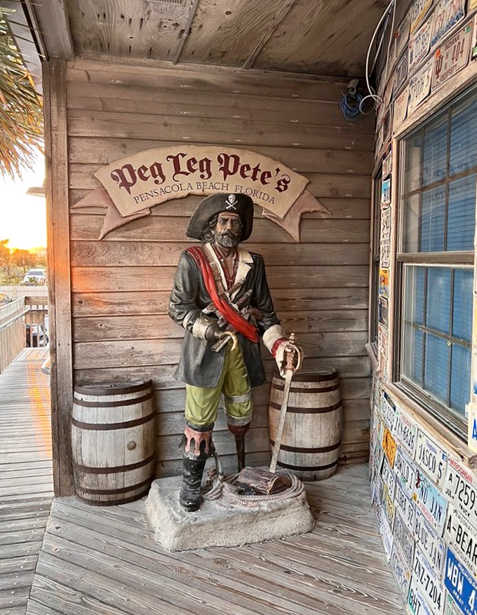 The establishment's namesake stands guard, a wooden sentinel who's seen thousands of satisfied customers come and go through his weathered doors.