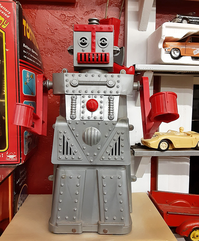Robert the Robot stands at attention, ready to serve – a mechanical marvel from when the future looked bright, shiny, and decidedly atomic.