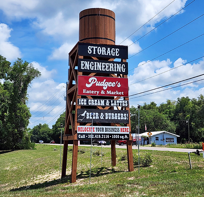 Standing tall against the Florida sky, Pudgee's water tower sign serves as a beacon to hungry travelers &ndash; "Ice Cream & Lattes" never looked so inviting.