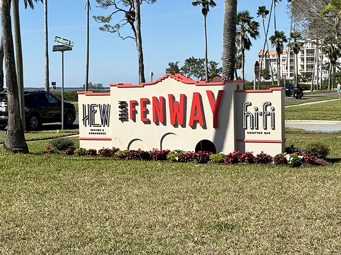 The entrance sign announces three treasures in one location: HEW Chophouse, the historic Fenway, and our rooftop destination, Hi-Fi.