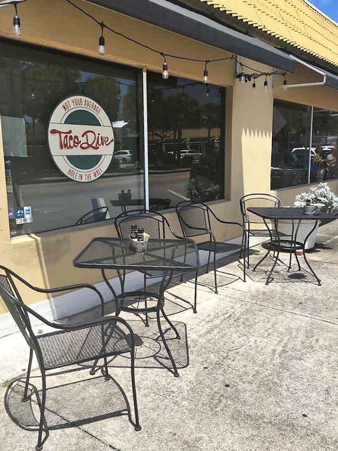 Folding glass doors blur the line between inside and out, creating an airy atmosphere that captures everything great about Florida dining.