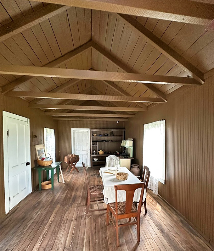 Pioneer living rooms served multiple purposes – dining area, workspace, classroom, and social center all in one practical space.