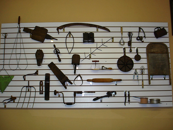 This wall of vintage tools showcases the ingenuity of earlier generations, when craftsmanship was king and every implement had a specific purpose.