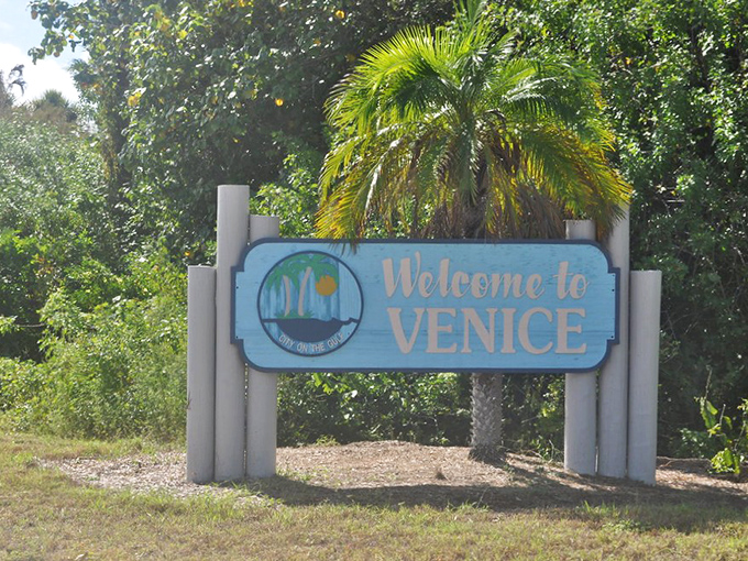 This welcome sign doesn't just mark city limits—it's the gateway to your shark tooth hunting adventure.