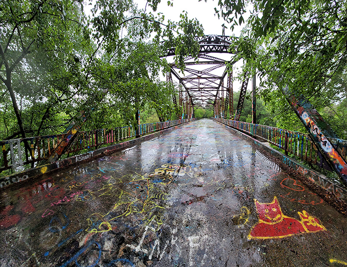 After rain, the colors seem to intensify, as if the bridge is refreshed and ready for another day of inspiring visitors with its unlikely beauty.