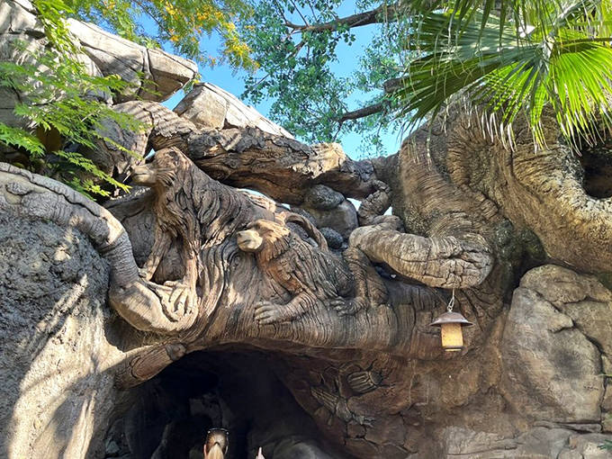 These massive root archways invite exploration, creating mysterious passages that lead visitors on a journey of discovery beneath the canopy.