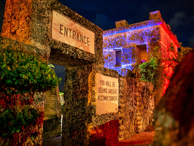 Coral Castle transforms at night, its mysterious structures illuminated with colorful lights that add another layer of enchantment to the enigma.