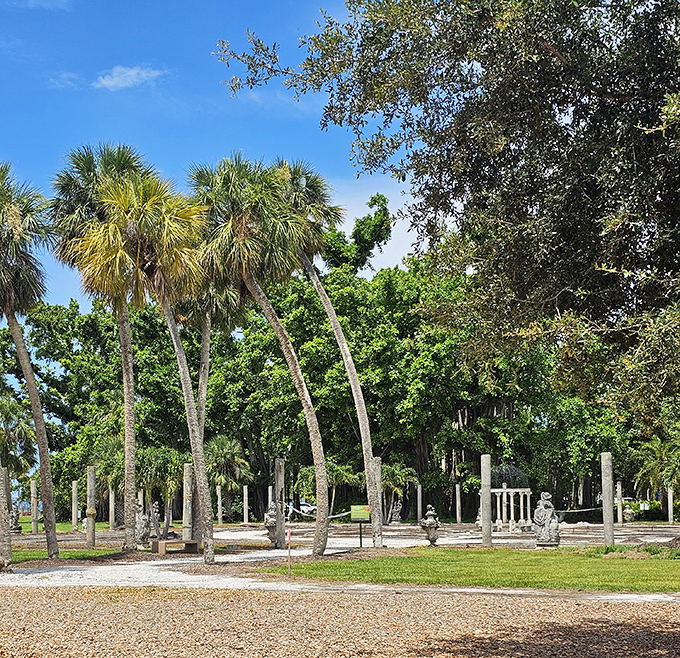The combination of palms and manicured lawns creates that distinctly Florida fancy vibe that makes you feel like you're on vacation.
