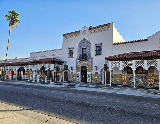 As evening approaches, the Columbia's exterior takes on a magical quality, its illuminated fa&ccedil;ade standing as a beacon of culinary tradition in historic Ybor City.