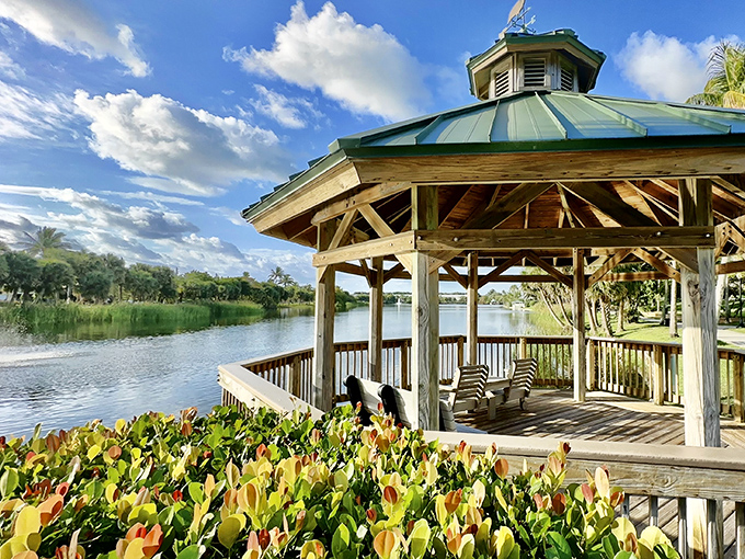 Waterfront sanctuary: The gazebo frames a perfect Florida tableau where water, sky, and greenery converge in a scene worthy of the finest postcard.