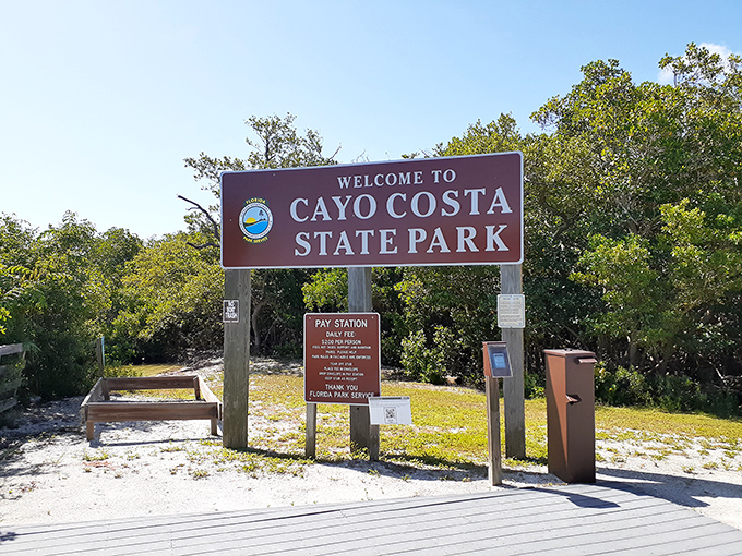 The park's entrance sign marks the boundary between ordinary Florida and the extraordinary natural experience that awaits beyond.