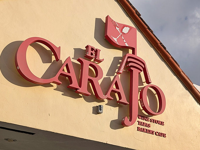 El Carajo's distinctive signage promises three delights in one location: a wine store, tapas restaurant, and bakery caf&eacute; &ndash; all behind gas pumps.
