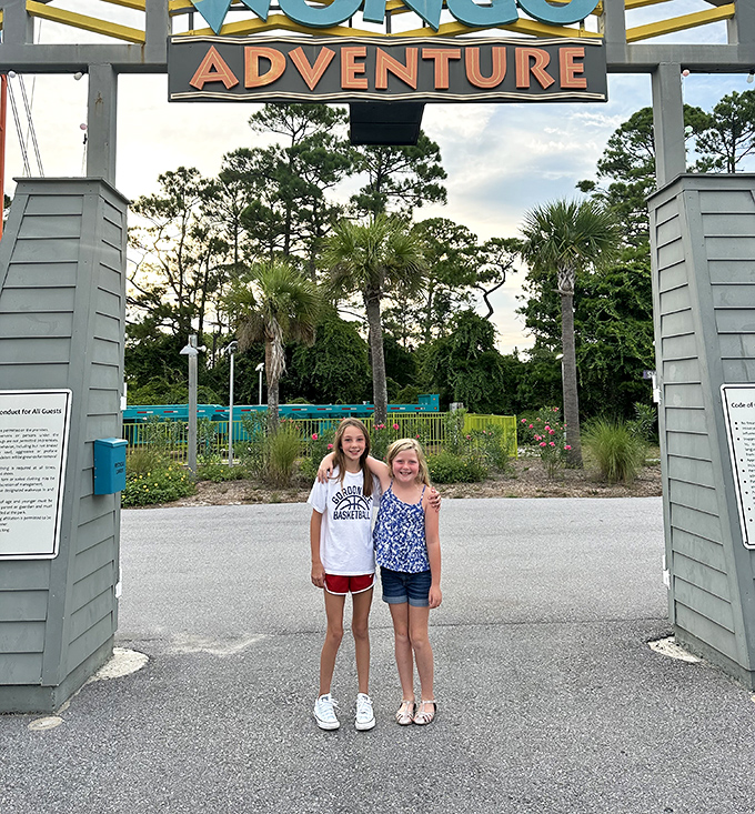 Young visitors pose at the Wongo Adventure entrance, their excited smiles capturing that magical moment before diving into a day of unforgettable family fun.