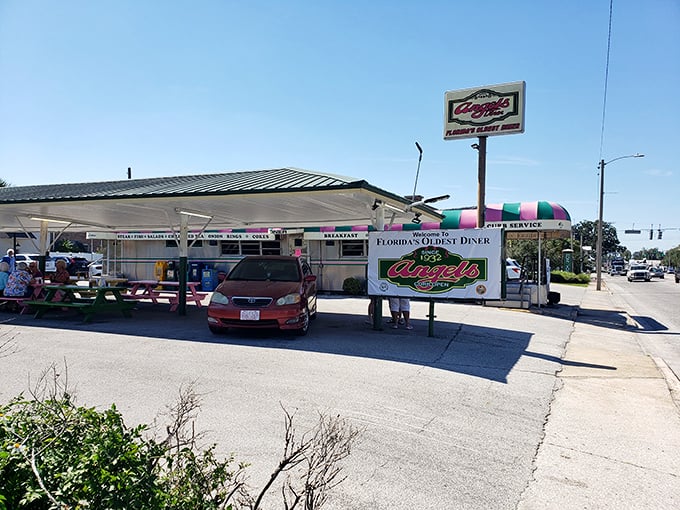 Angel's Dining Car proudly displays its "Florida's Oldest Diner" sign, a chrome-and-neon beacon that's been drawing hungry travelers since the Roosevelt administration.