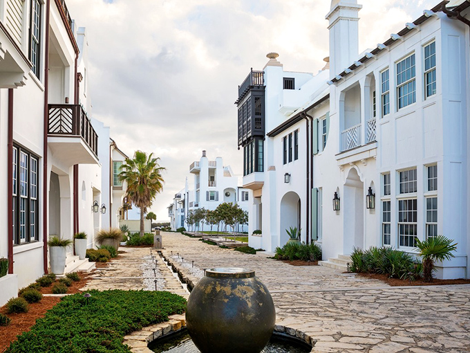 Strolling through Alys Beach feels like discovering a secret Greek island village, complete with elegant courtyards and swaying palms.