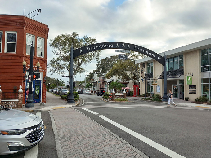 Dunedin's charming downtown features the "Defending Freedom" arch, inviting visitors to explore the historic streets filled with antique shops.