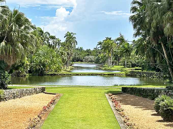 Palm trees stand guard like tropical sentinels over this stunning water view in Coral Gables.