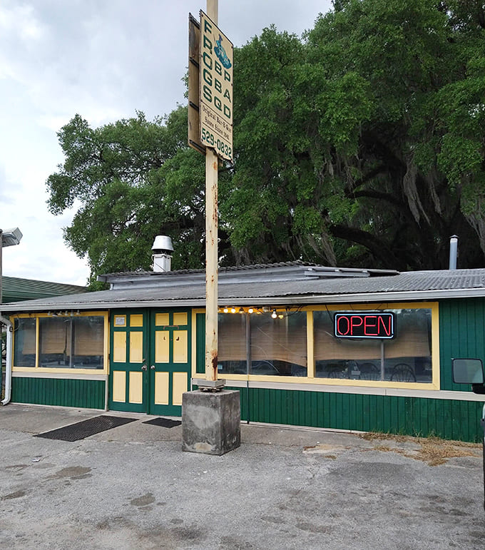 When that neon "OPEN" sign glows, you know tender, smoky goodness awaits inside this unassuming BBQ paradise.