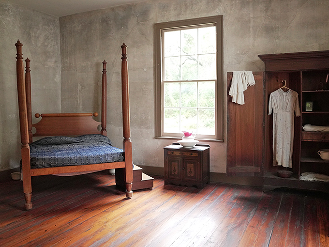 No Netflix needed here &ndash; just imagine the dreams that visited sleepers in this four-poster bed with its simple blue quilt.