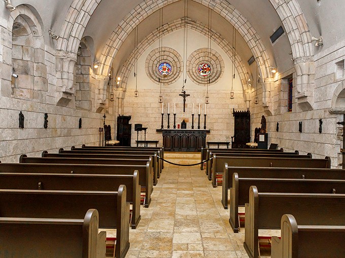 Simple stone elegance creates perfect acoustics where even whispered prayers seem to linger in centuries-old air.