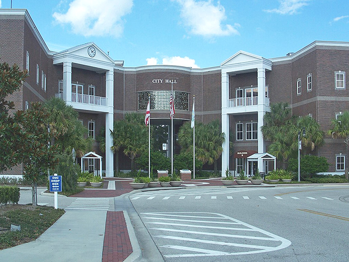 Stately brick and classical columns stand as St. Cloud's civic heart, where small-town governance happens with refreshing transparency.