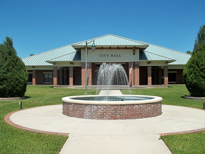 City Hall's fountain creates a serene centerpiece, where local government meets small-town charm in perfect bureaucratic harmony.