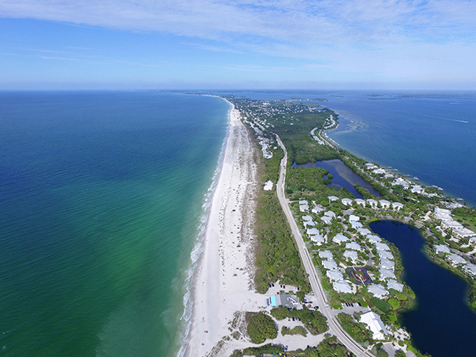 From above, Gasparilla Island reveals its slender beauty &ndash; a ribbon of white sand embraced by the turquoise Gulf and deeper blue harbor waters.