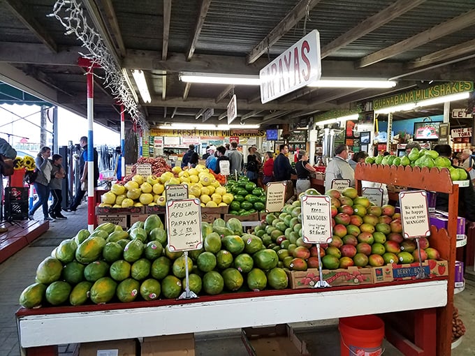 Mountains of mangoes, papayas, and avocados create a colorful landscape that would make any fruit lover weak at the knees.