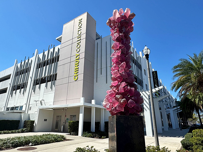 The museum's exterior announces its artistic mission with a striking pink glass tower that stands like a contemporary lighthouse for art seekers.