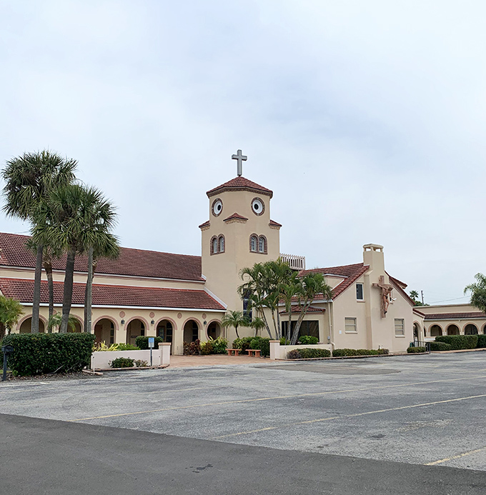 Front and center! The Mediterranean-style fa&ccedil;ade welcomes visitors with its warm cream walls and distinctive red-tiled roof.