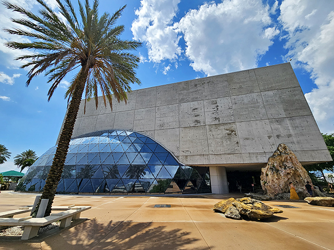 Concrete meets dreamscape as the museum's bold architecture mirrors the surrealist masterpieces housed within its walls.