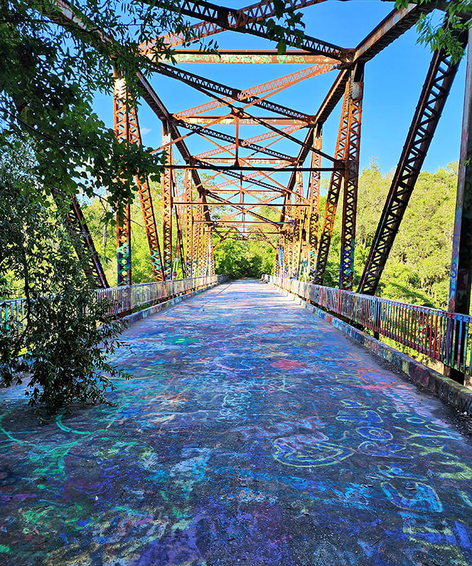 Walking this kaleidoscopic pathway feels like stepping into a living art installation where every visitor leaves their mark on history.