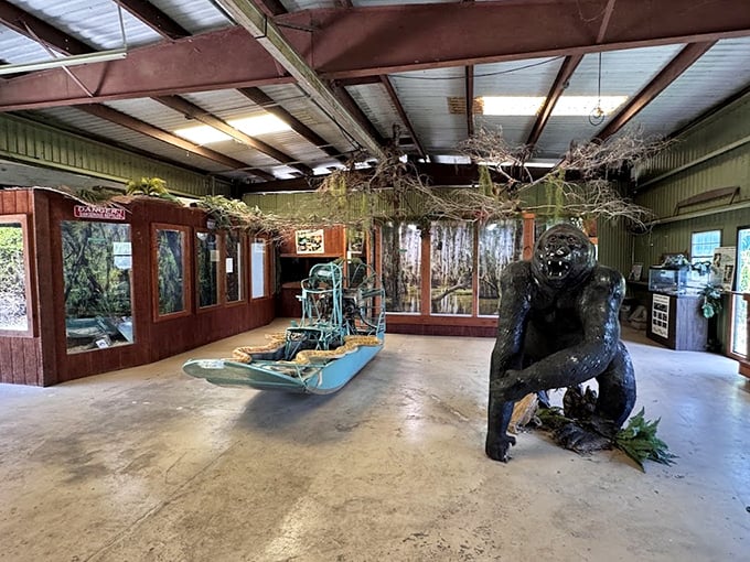 Inside the research center, an airboat and another Skunk Ape figure create an atmosphere where wilderness adventure meets cryptozoological curiosity.