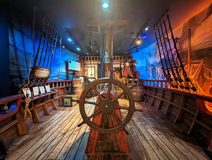 Step aboard history as you enter this meticulously recreated ship's deck, where the captain's wheel awaits your command.