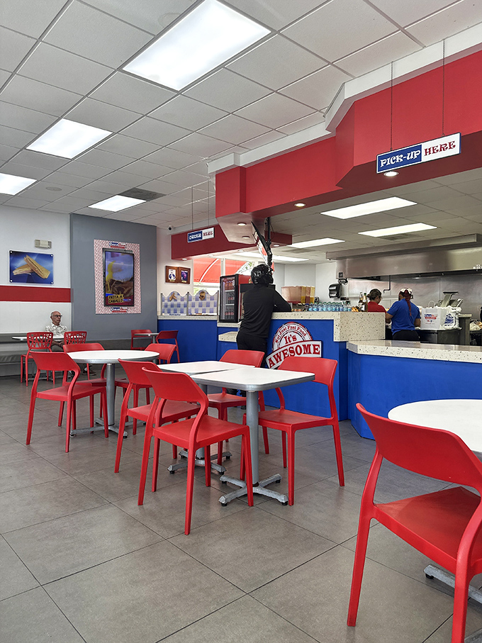 Simple yet inviting, the interior's bold red chairs and clean design put the focus where it belongs—on the food that's about to rock your world.