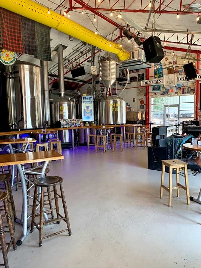 Gleaming stainless steel tanks and industrial-chic yellow ductwork create a brewery wonderland where beer magic happens before your eyes.
