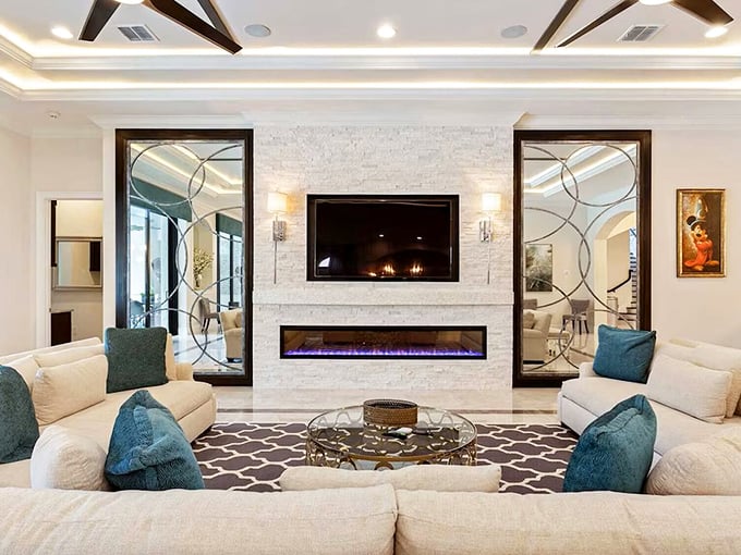 The living room marries modern luxury with storybook charm &ndash; those geometric mirrors reflecting both the space and your childlike wonder.