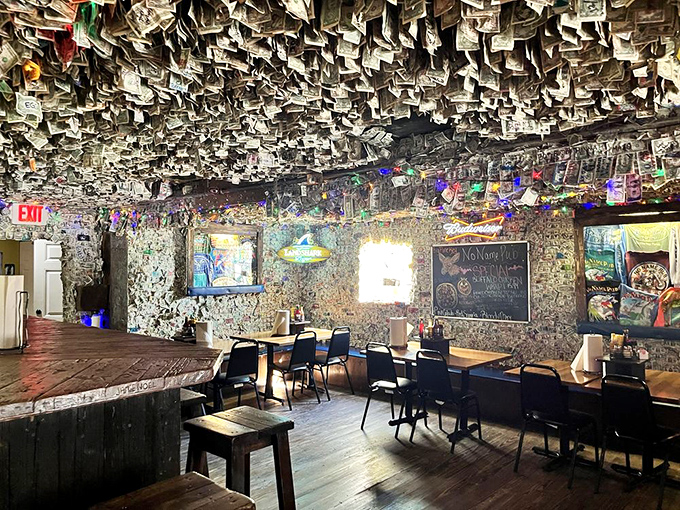 Step inside and witness the green tapestry of memories – thousands of dollar bills transform this humble pub into a living scrapbook of good times.