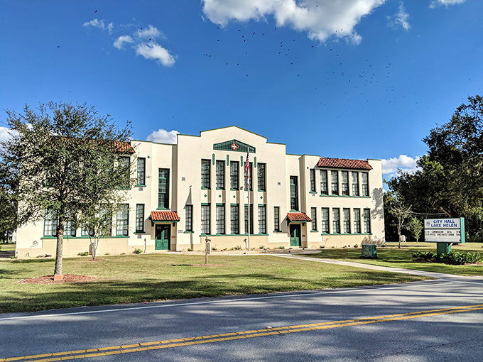 The Lake Helen City Administration building stands as a proud testament to Spanish-influenced architecture, its windows catching sunlight like they're winking at passersby.