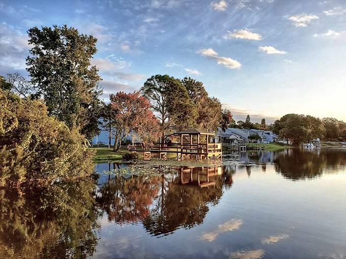 The lakeside pavilion offers a perfect spot for gatherings, where conversations flow as smoothly as the gentle waters nearby.