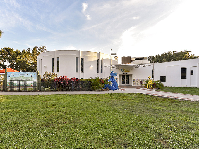 The museum's sleek white exterior houses a world of wonder within, promising adventures for curious minds of all ages.