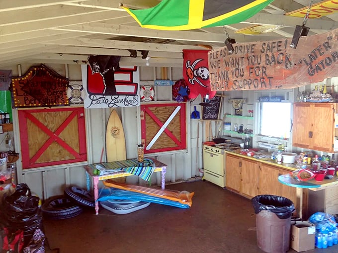 Inside reveals a cozy time capsule &ndash; flags, surfboards, and "drive safe" messages creating a quirky nautical hideaway.