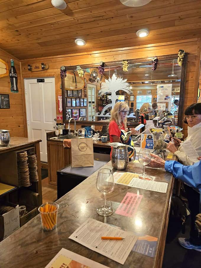 Inside, warm wood paneling and beach-inspired decor create a tasting room that's equal parts sophisticated and "shoes optional."