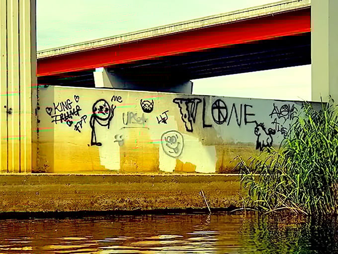 Graffiti under the highway bridge tells its own stories &ndash; some artistic, some cryptic, all adding character to this already mysterious area.
