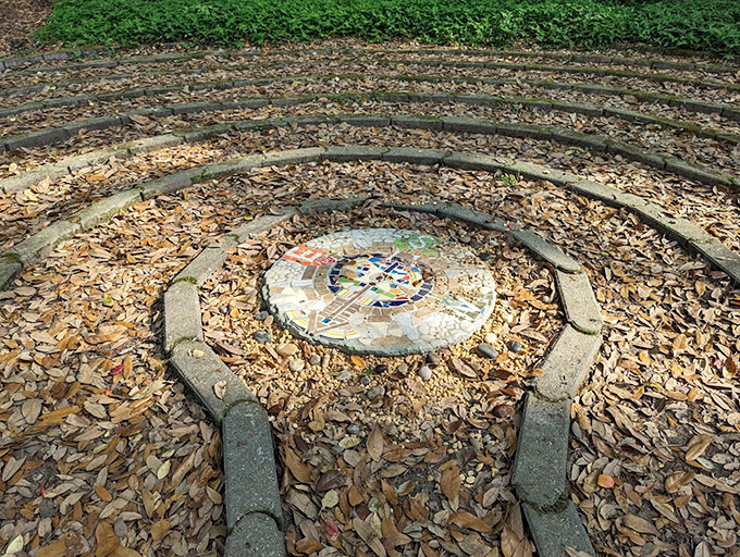 At the labyrinth's heart, this mosaic centerpiece invites contemplation &ndash; a colorful reward for the mindful journey.