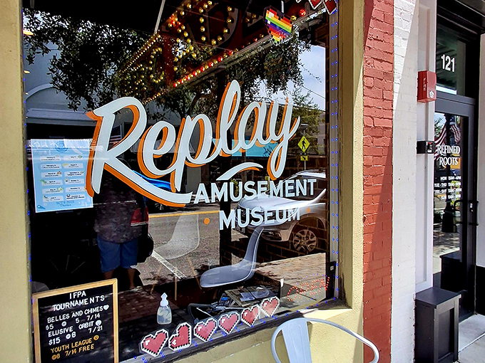 The storefront beckons with retro charm, its "Replay Amusement Museum" sign promising a journey back to when high scores were social currency.