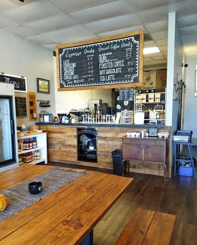 Warm wooden accents and comfortable seating create the perfect backdrop for coffee conversations and quiet contemplation.