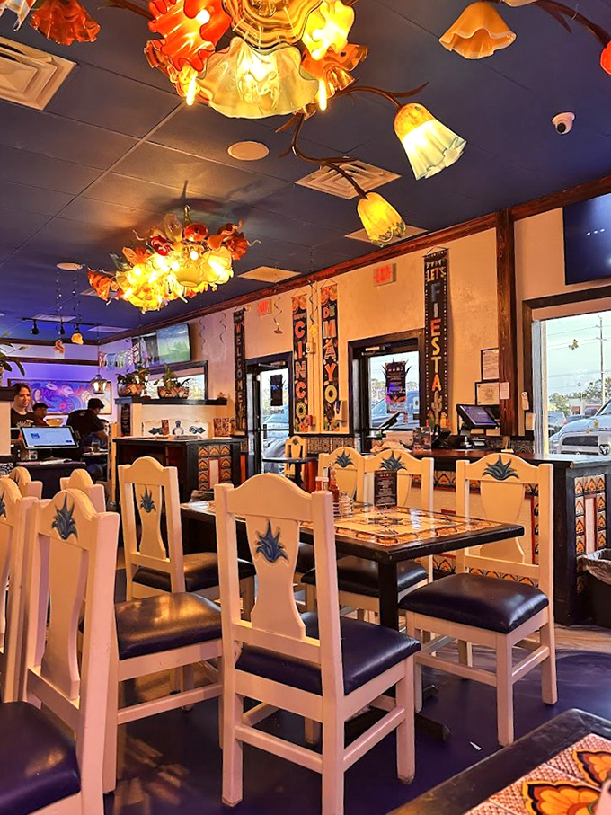 Step inside and be transported by vibrant d&eacute;cor and those stunning flower-shaped light fixtures. Mexican magic overhead!